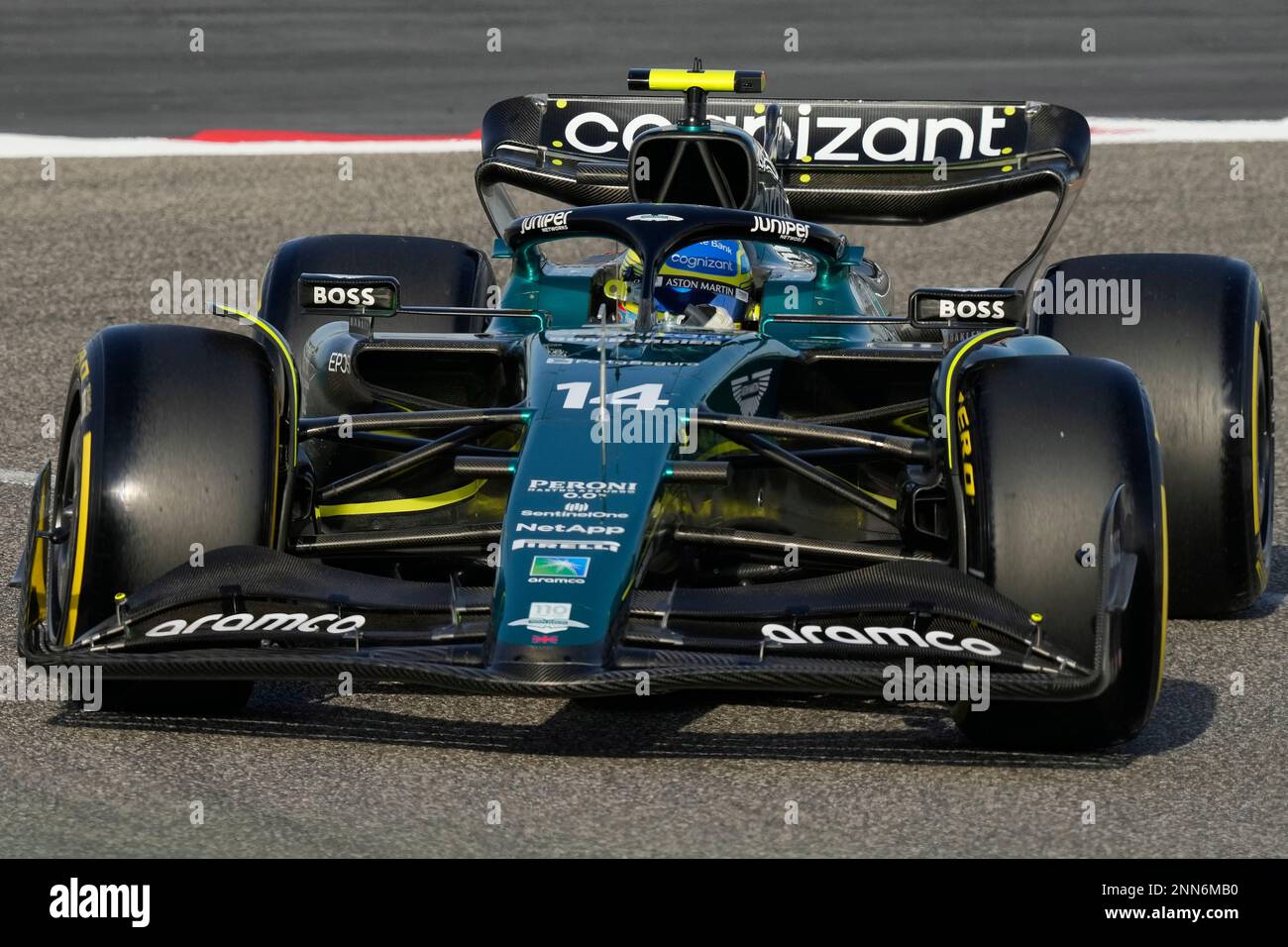 Aston Martin driver Fernando Alonso of Spain steers his car during a ...