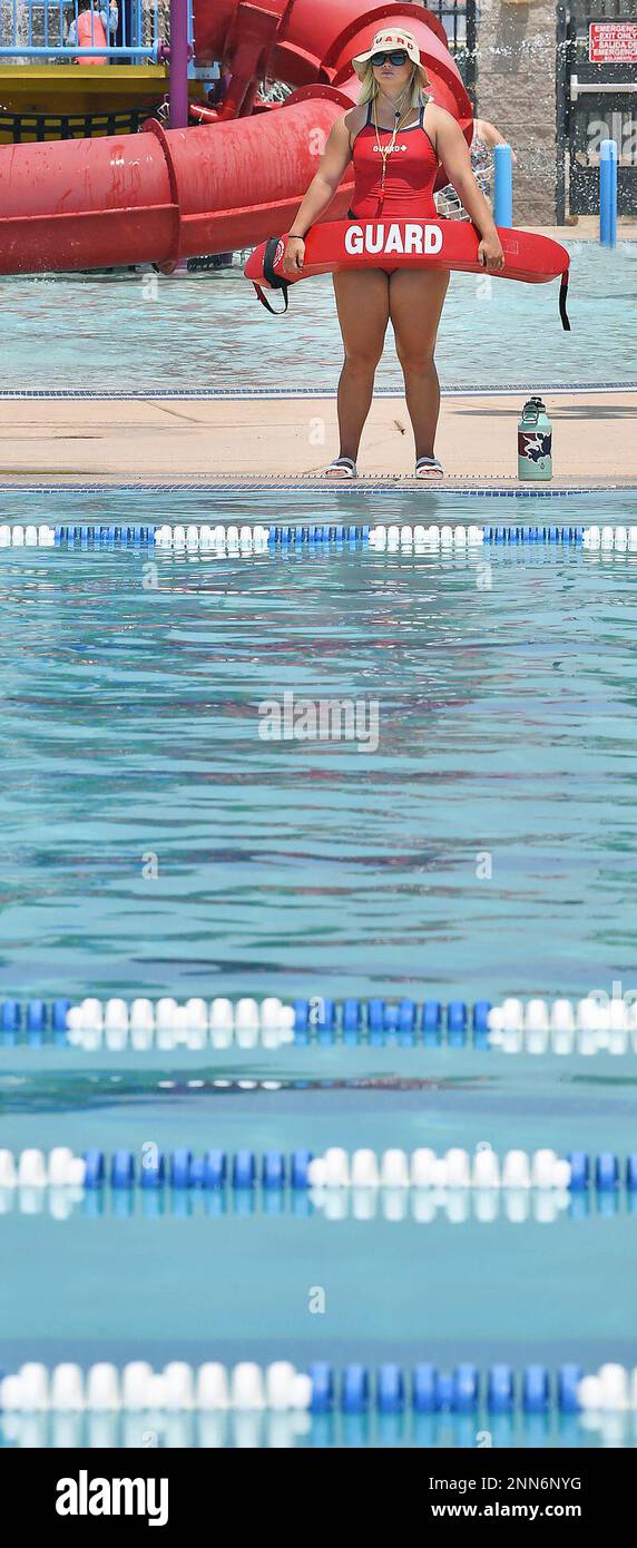 Lifeguard Payton Kessler keeps watch at the Valley Aquatic Center in ...