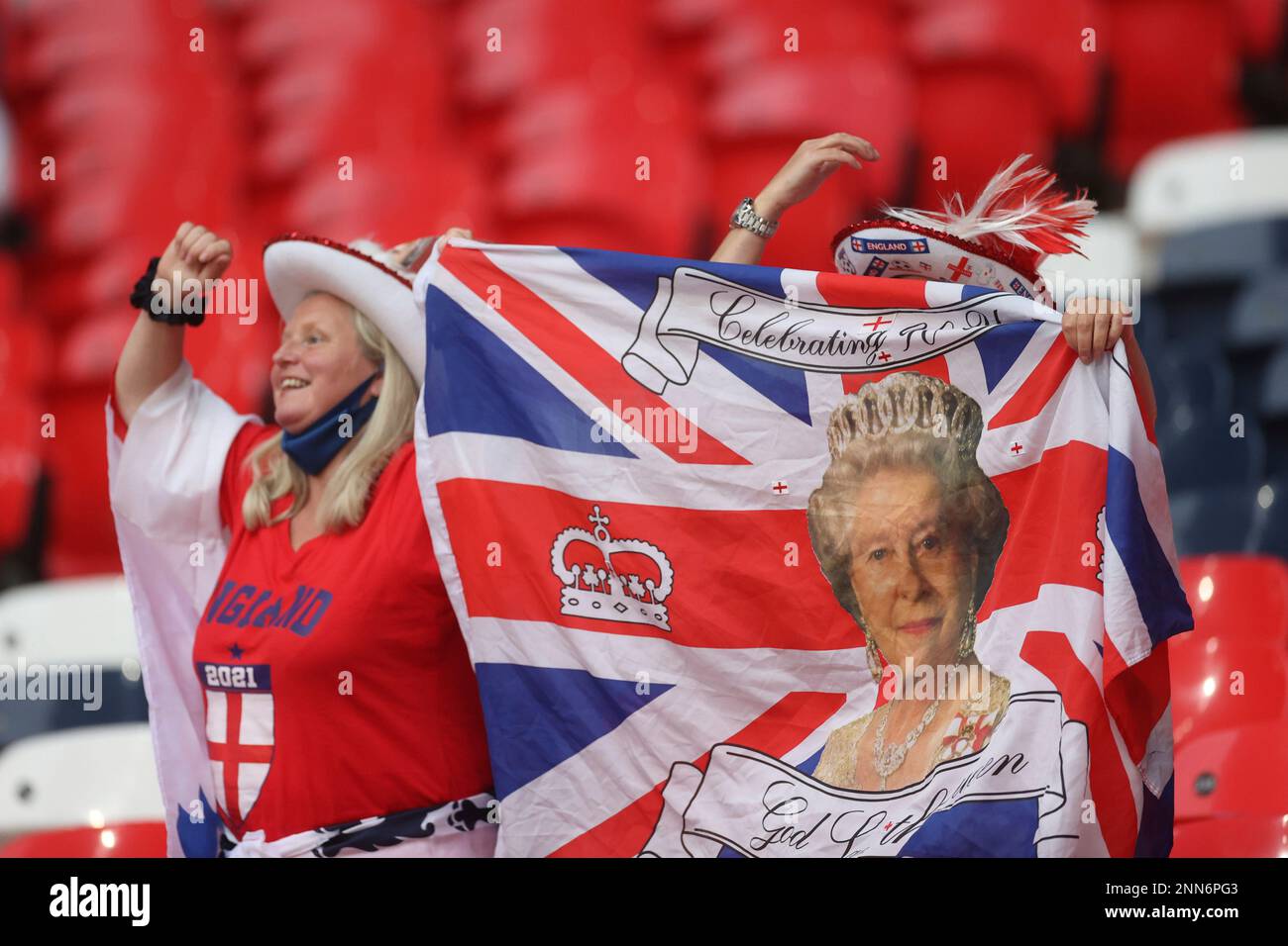 An England fan shows a flag before the start of the Euro 2020 soccer ...