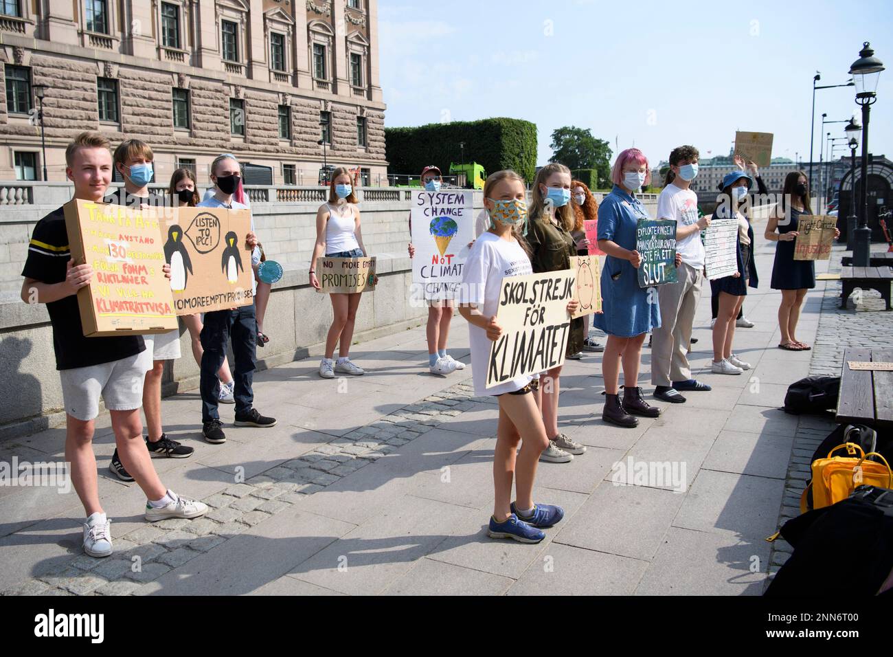 Swedish climate activist Greta Thunberg, center, and other climate ...