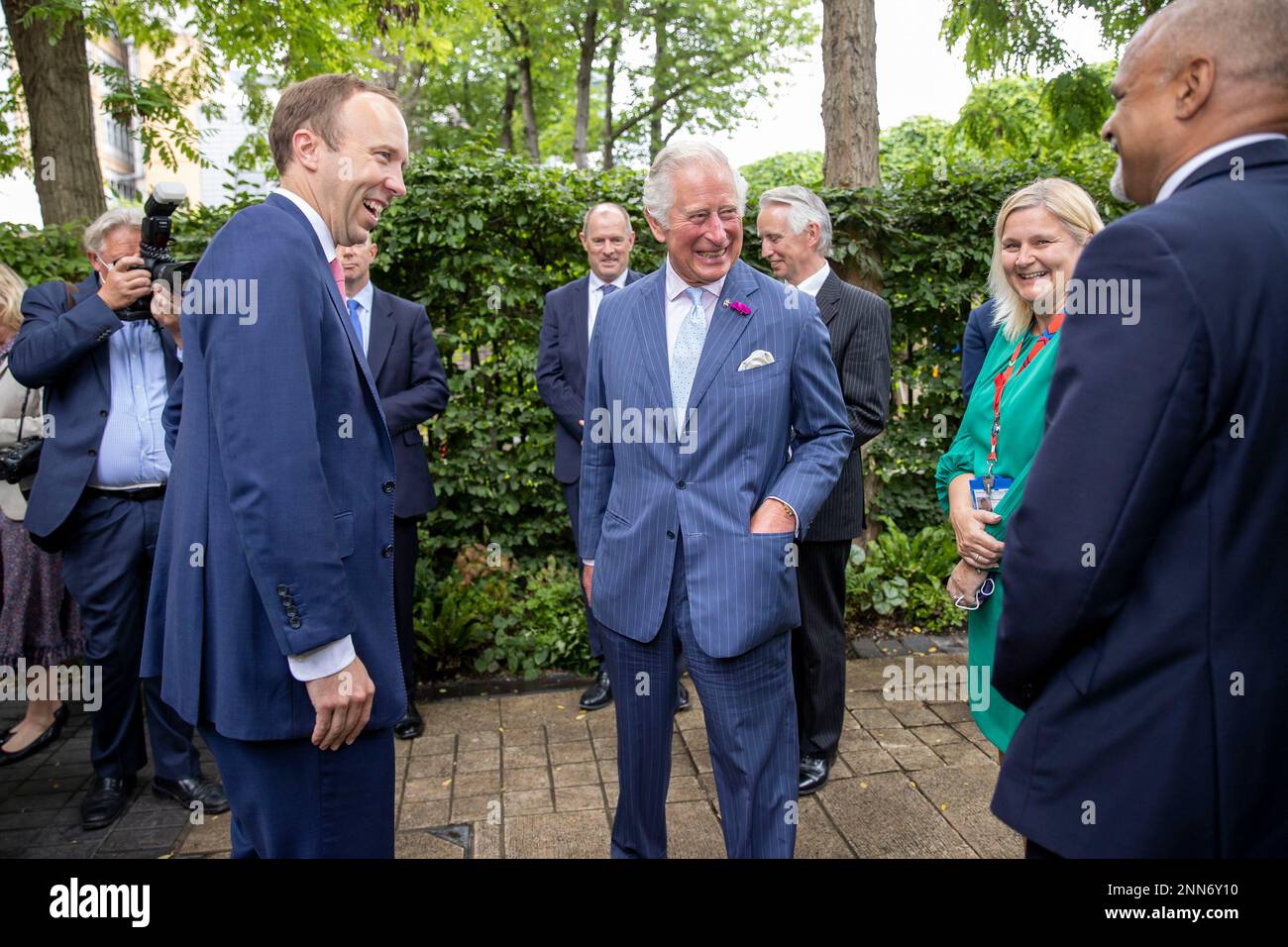 Britain's Prince Charles and Health Secretary Matt Hancock, left, meet ...