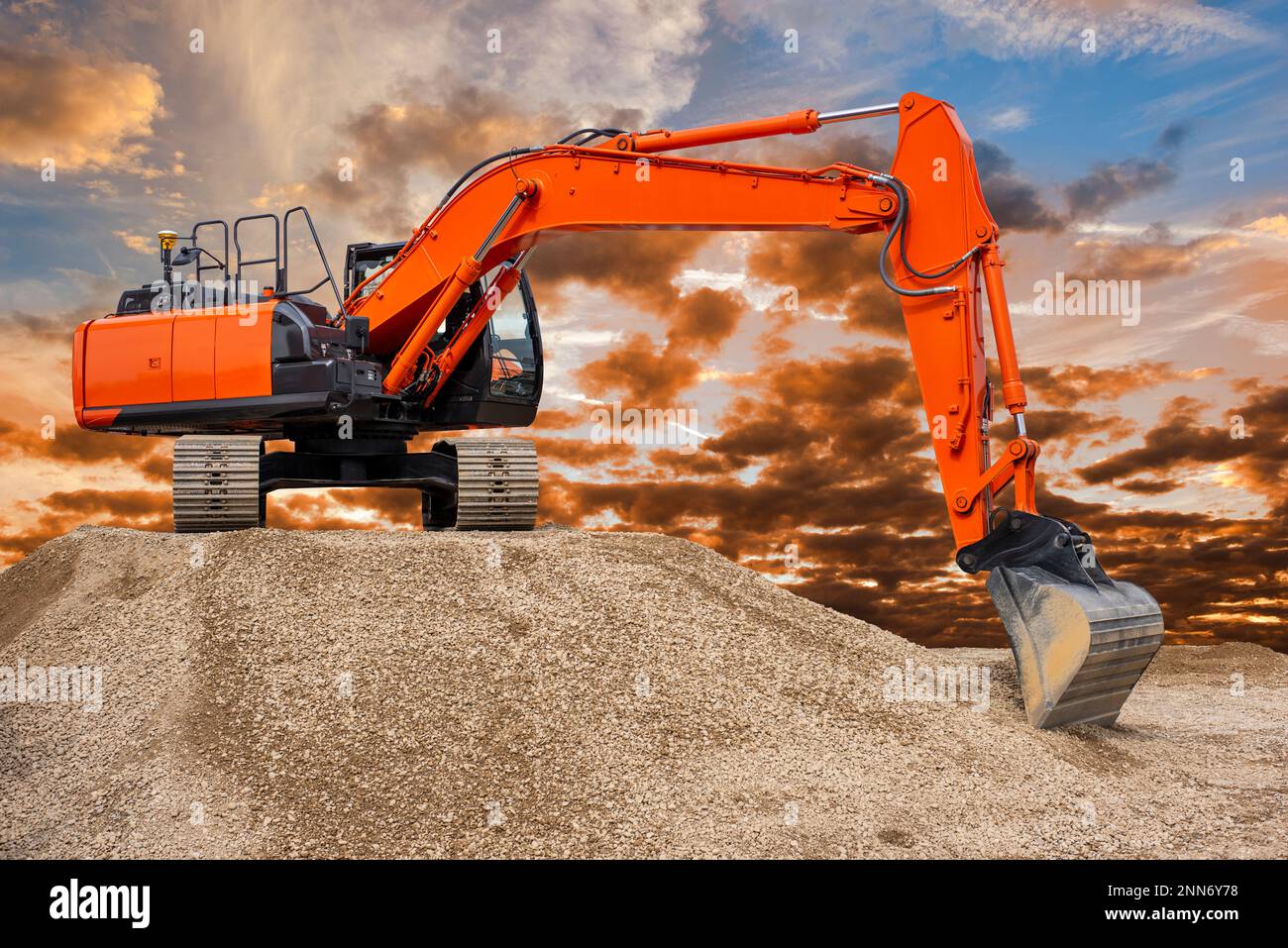 excavator is digging and working at construction site Stock Photo - Alamy