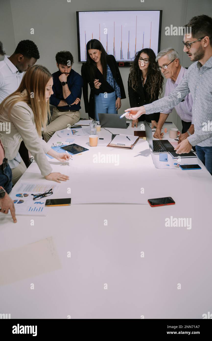 Diverse group of people planning a new strategy for their next project ...