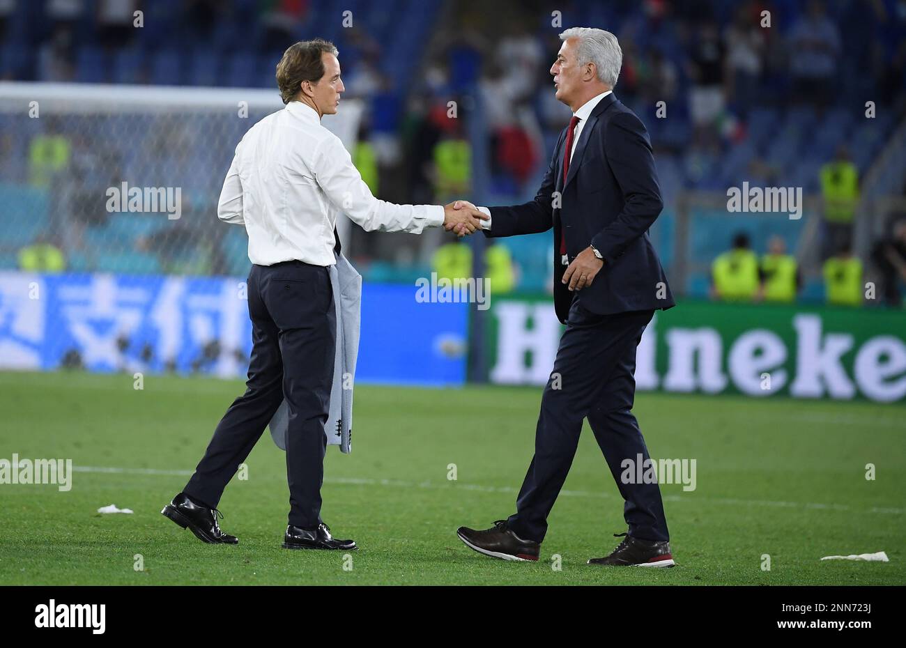 Italy's manager Roberto Mancini, left, meets Switzerland's manager ...