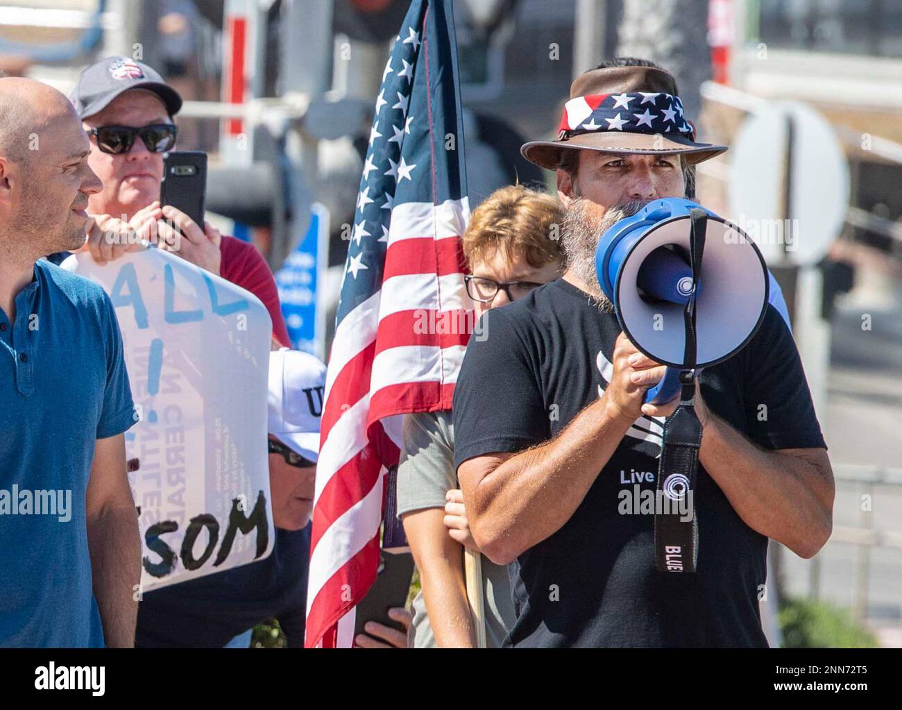 FILE - In this May 21, 2020, file photo Alan Hostetter, right ...