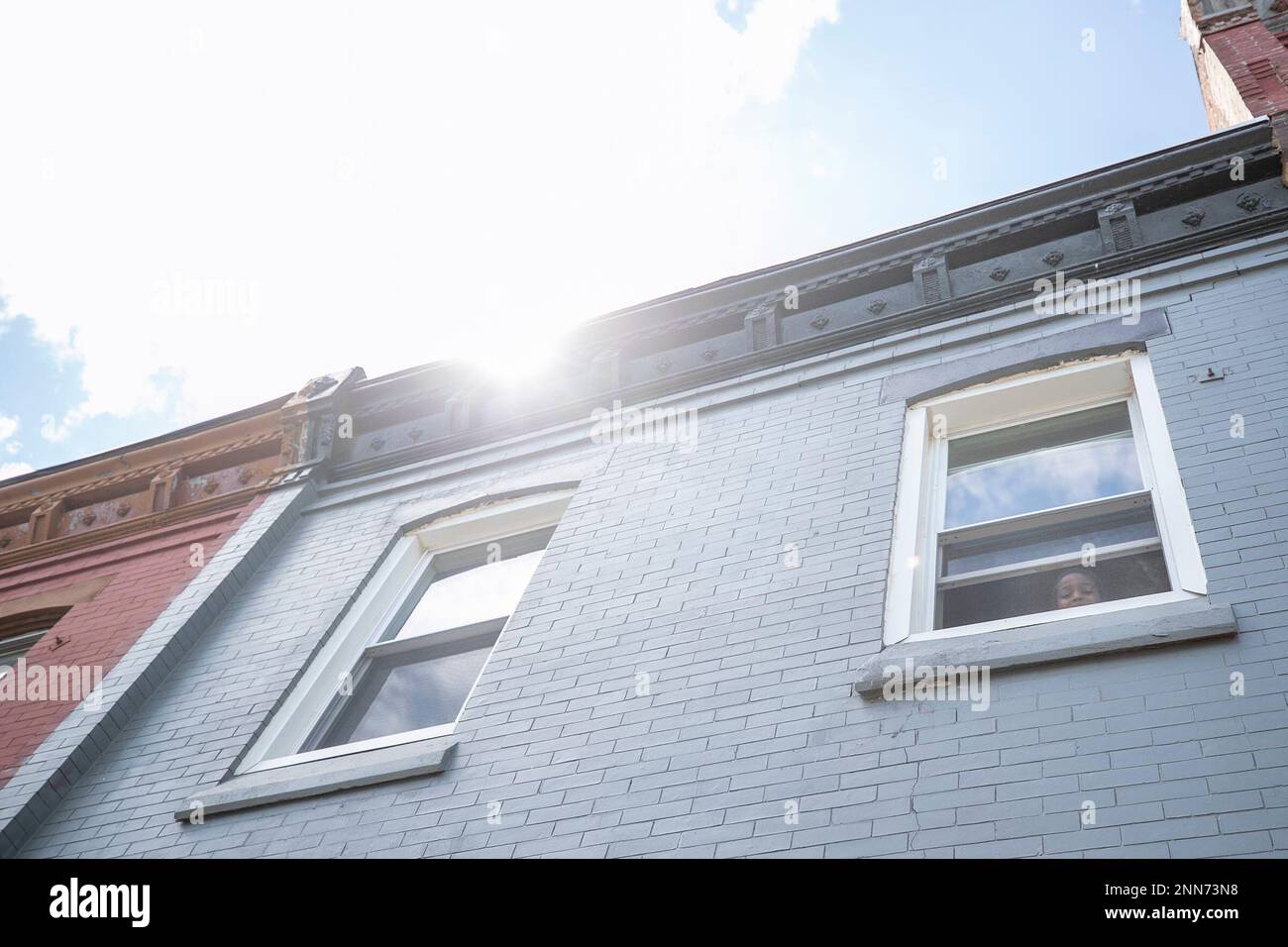 Student Kenneth Boatwright looks outside the window of his home in ...