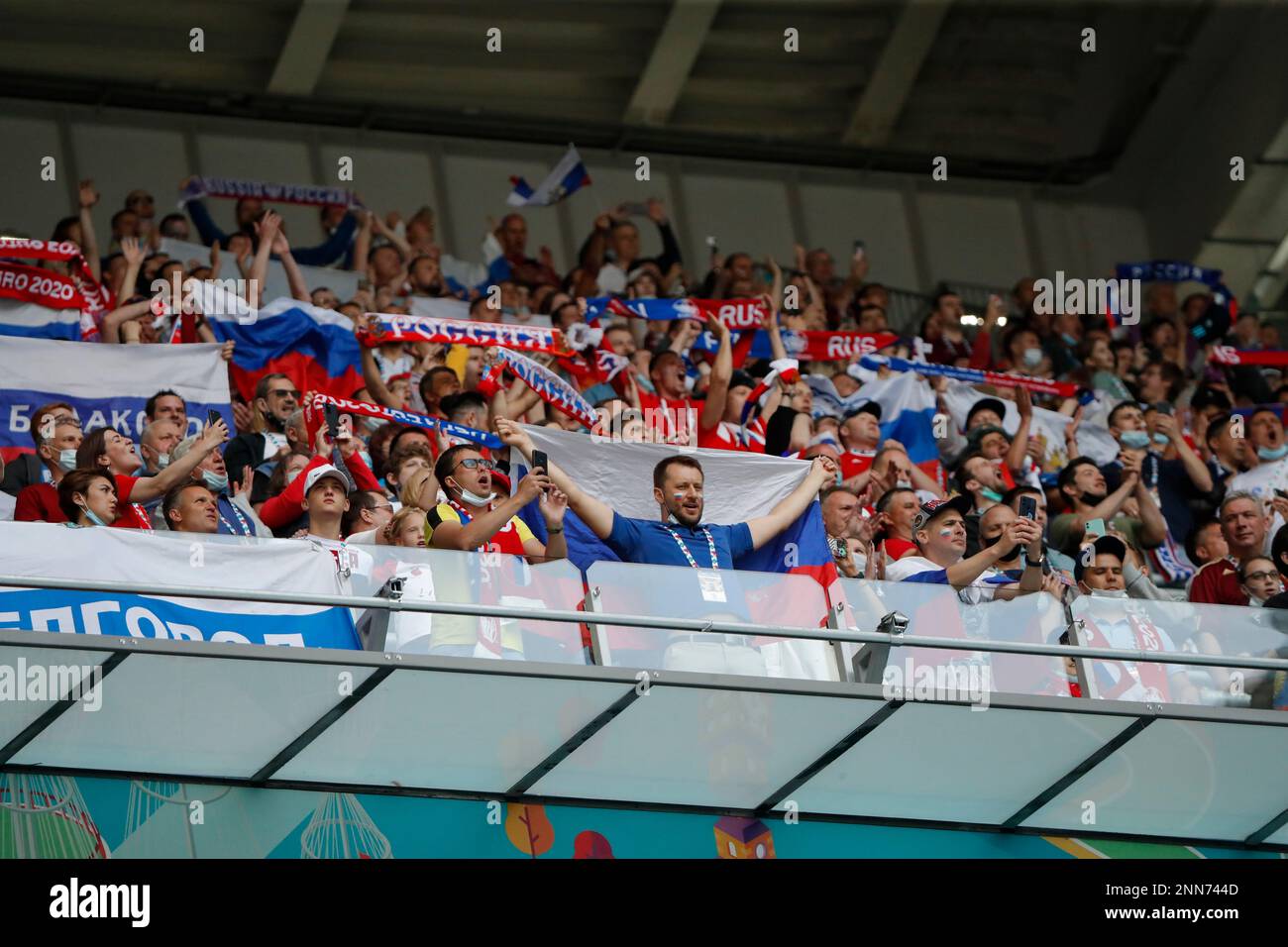 Russian fans sing the national anthem of their country prior to the ...