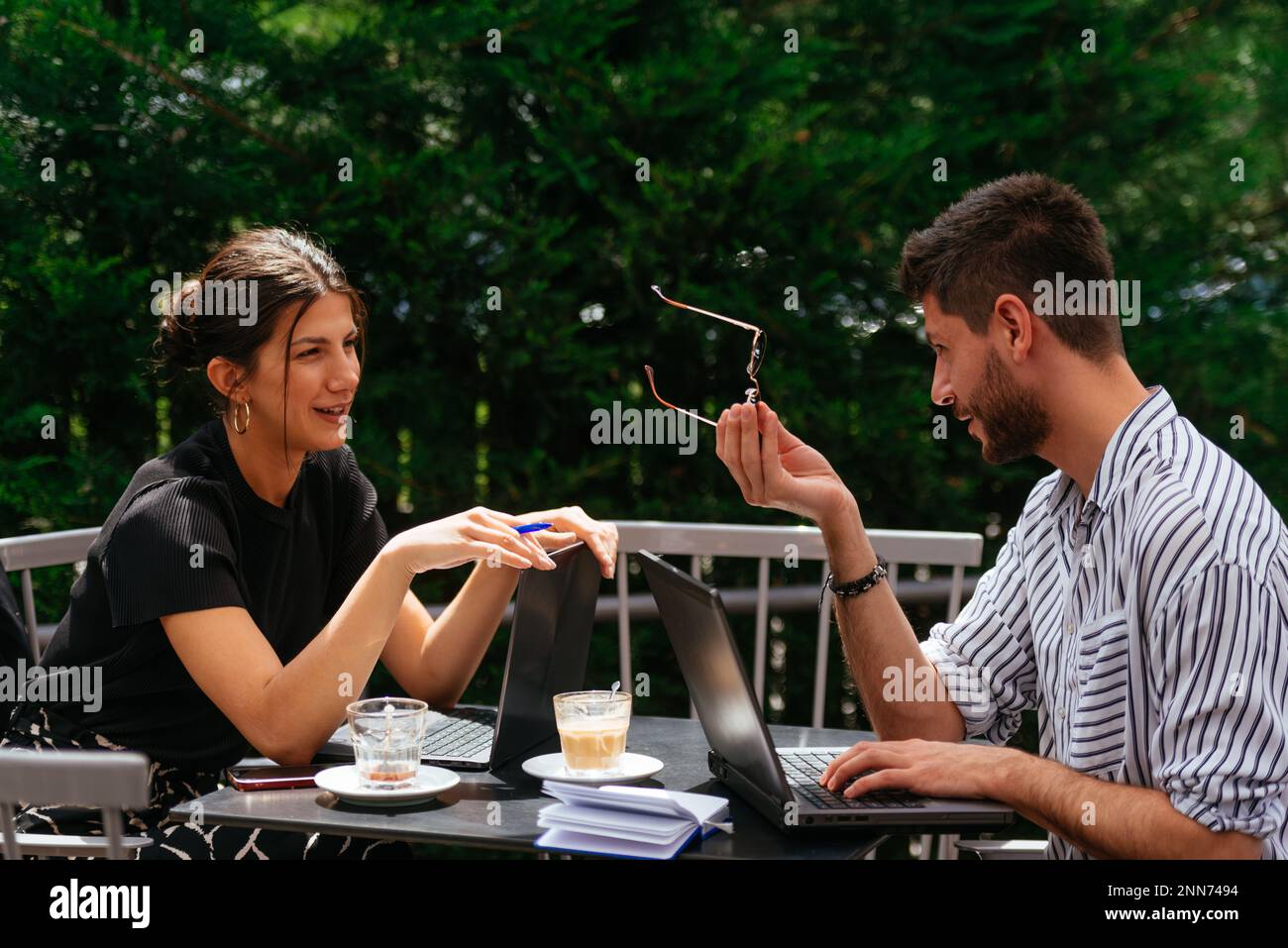 Talking a breal hi-res stock photography and images - Alamy