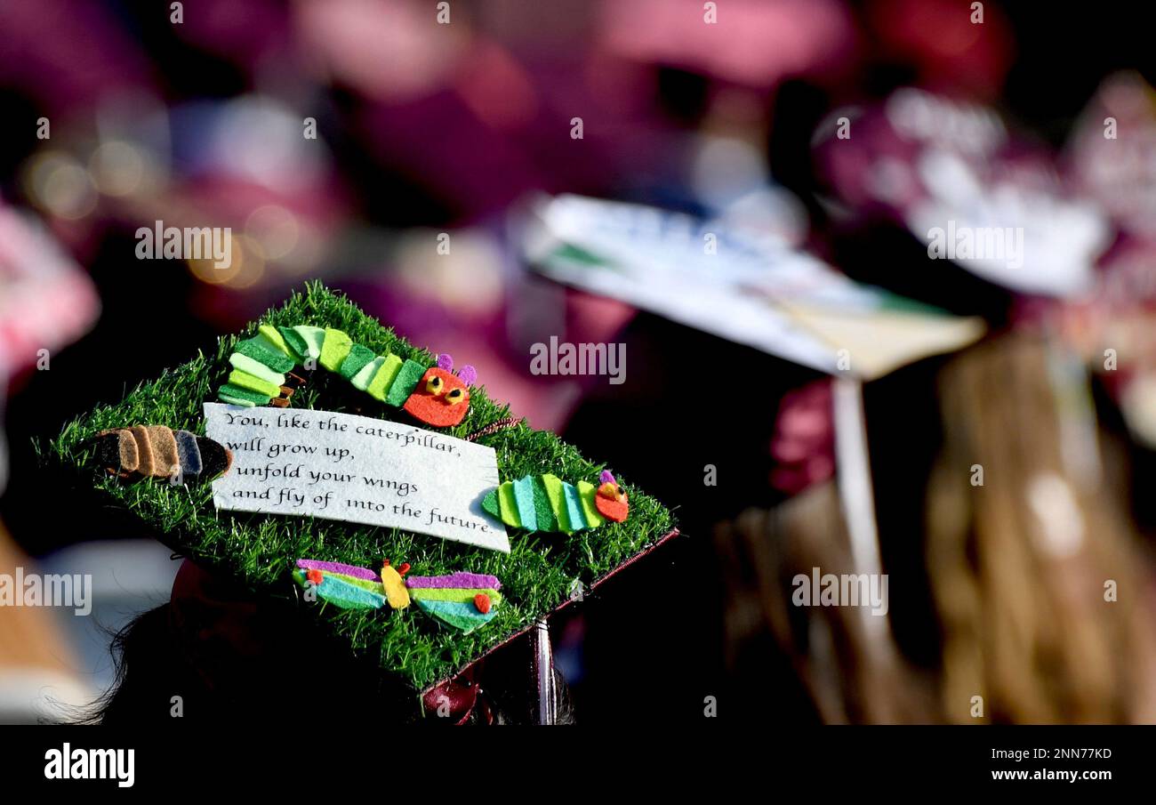 One of many mortarboard hats with messages on them during the 2021 Mt ...