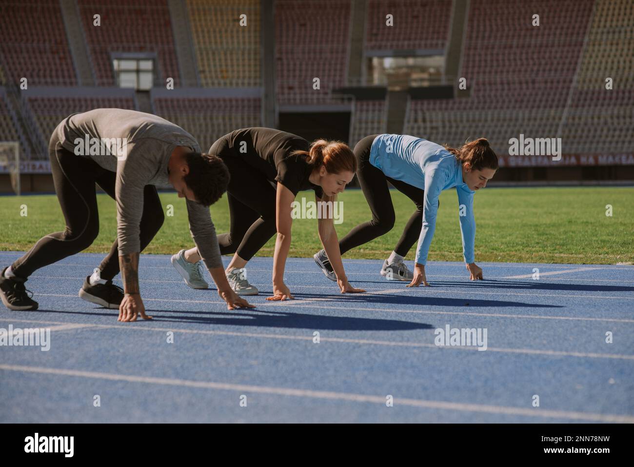 Three friends are training together. They are about to run a marathon ...