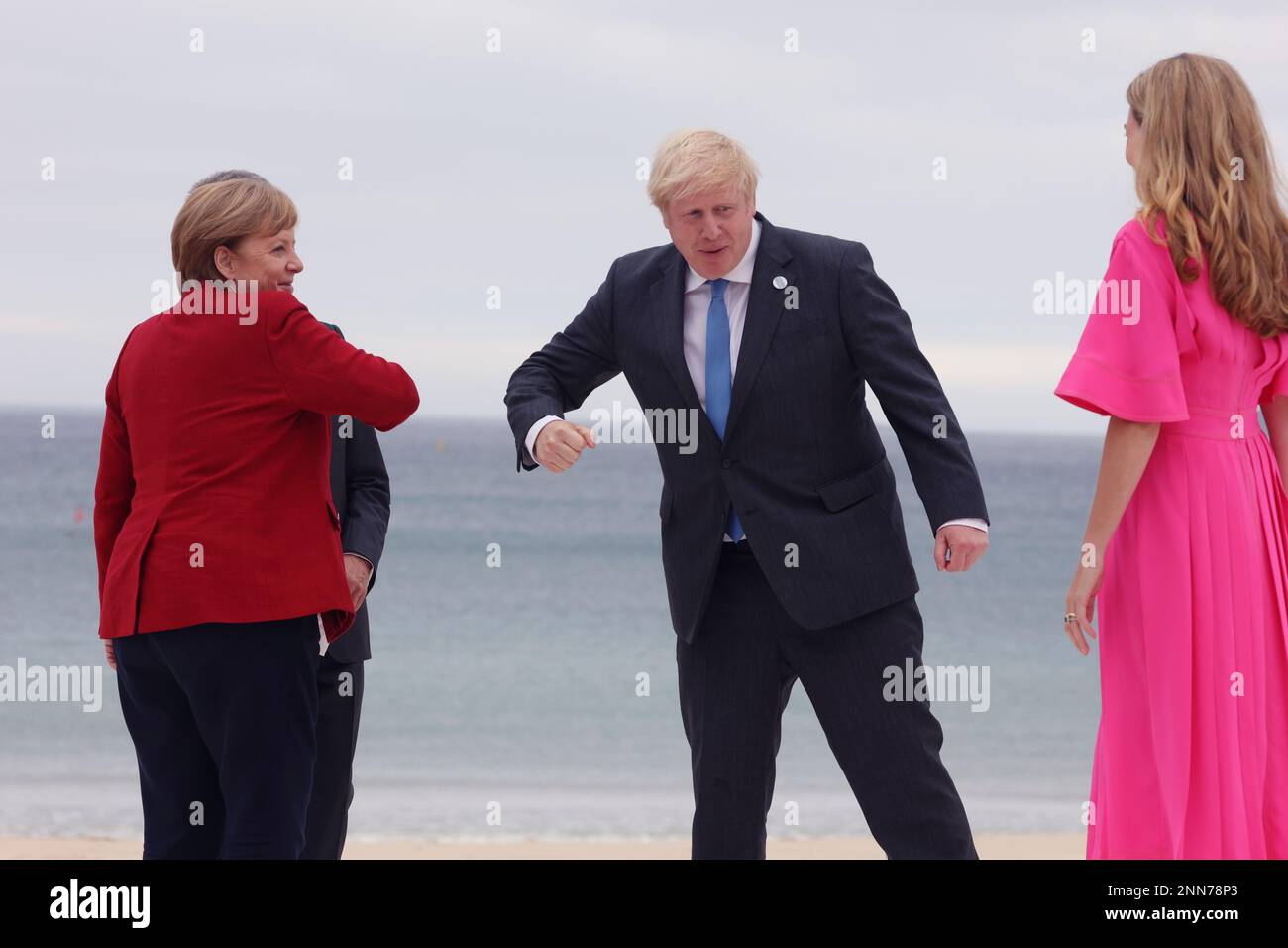 German Prime Minister Angela Merkel is greeted by Prime Minister of ...