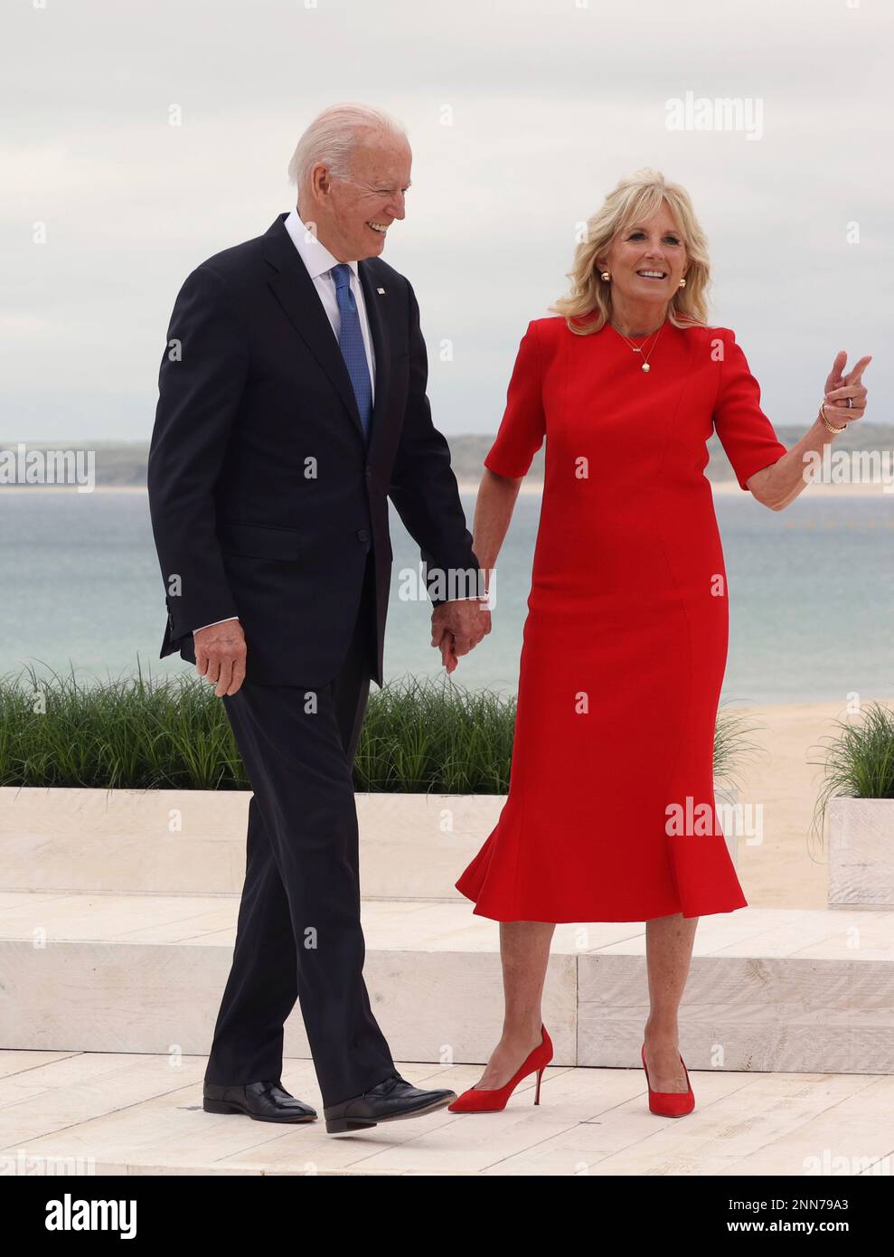 U.S. President Joe Biden and his wife Jill head for the welcome ...