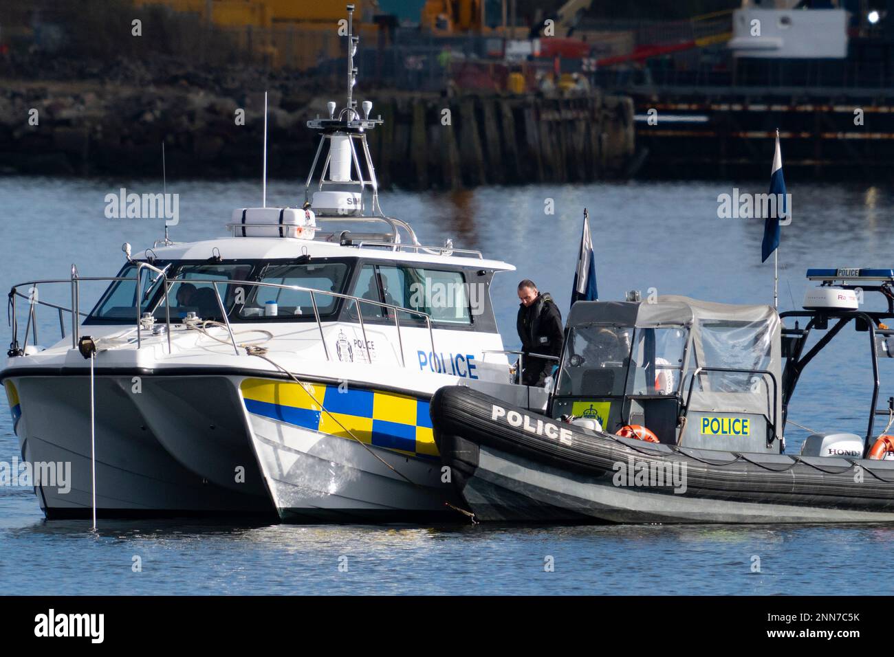 Greenock, Scotland, UK. 25 February 2023. Police and Pilot craft at ...