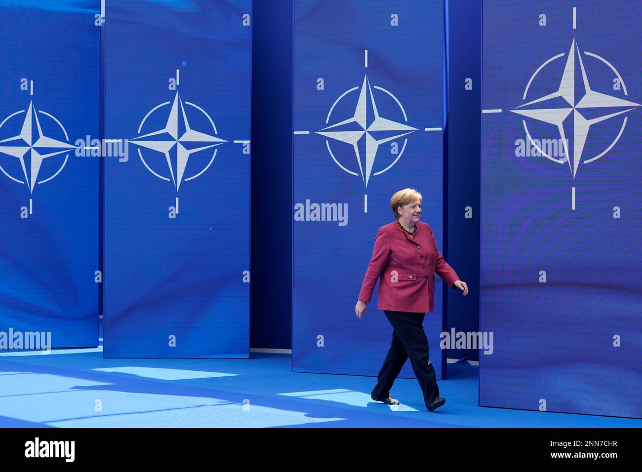 German Chancellor Angela Merkel arrives to pose for photos with NATO ...