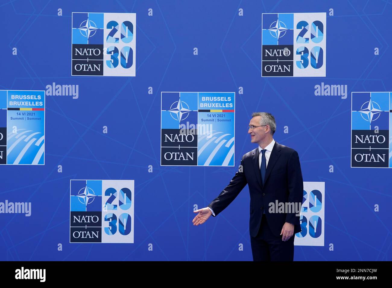 NATO Secretary General Jens Stoltenberg waits to pose for photos with ...