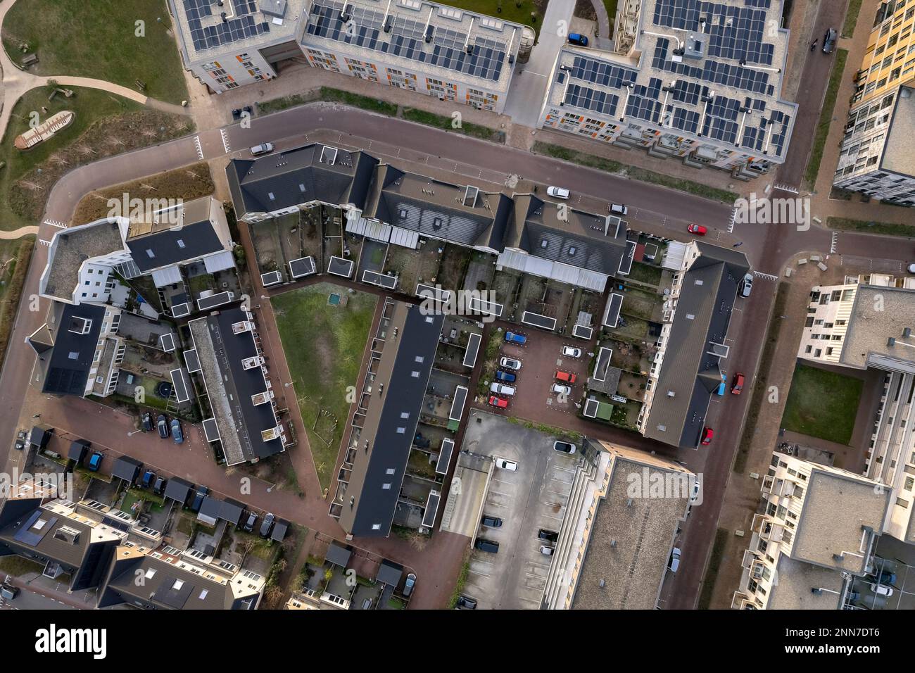 Top down view of residential complex seen from above with roof full of ...