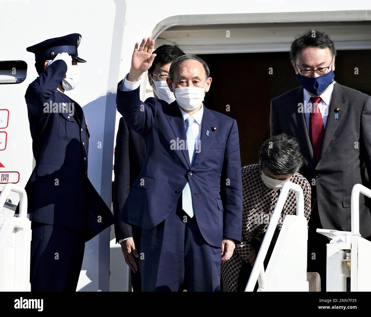 Japanese Prime Minister Yoshihide Suga and his wife Mariko leave for ...