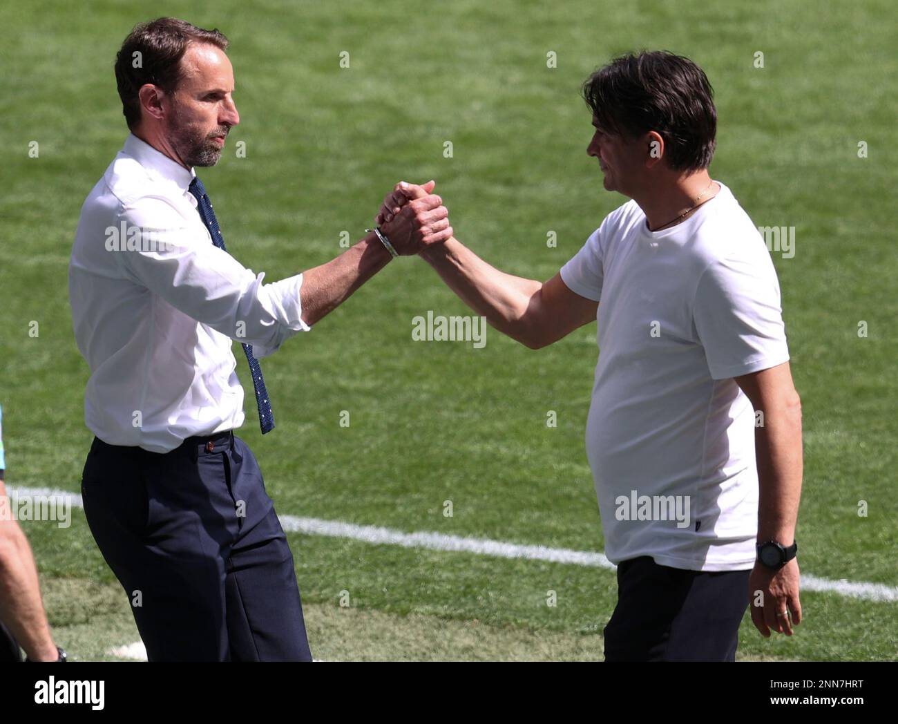 England's manager Gareth Southgate, left, and Croatia's manager Zlatko ...