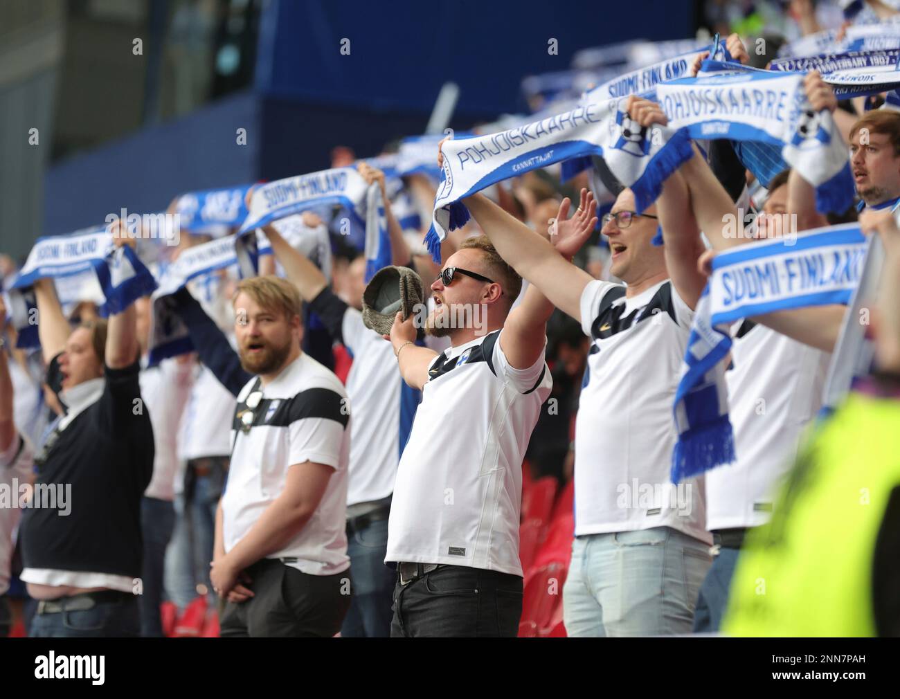 Finnish fans sing their national anthem prior the Euro 2020 soccer ...