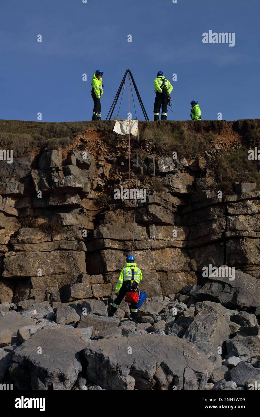 The Coastguard team out on exercise using lifting apparatus assisting a ...