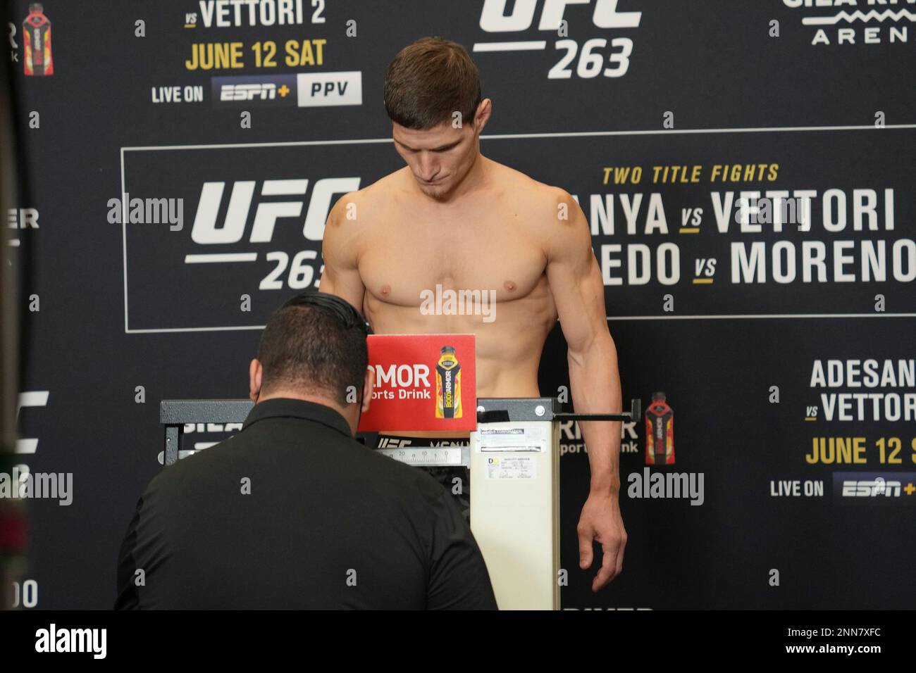PHOENIX, AZ - JUNE 11: Movsar Evloev steps on the scale for the ...