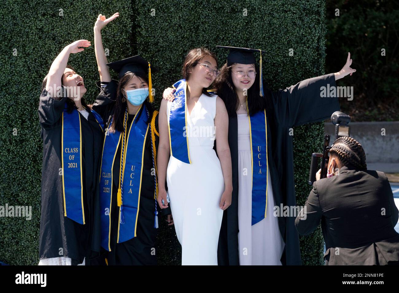 UCLA graduates, from left, Yuying Wang, Liyan Wu, Ziging Jiang, and ...