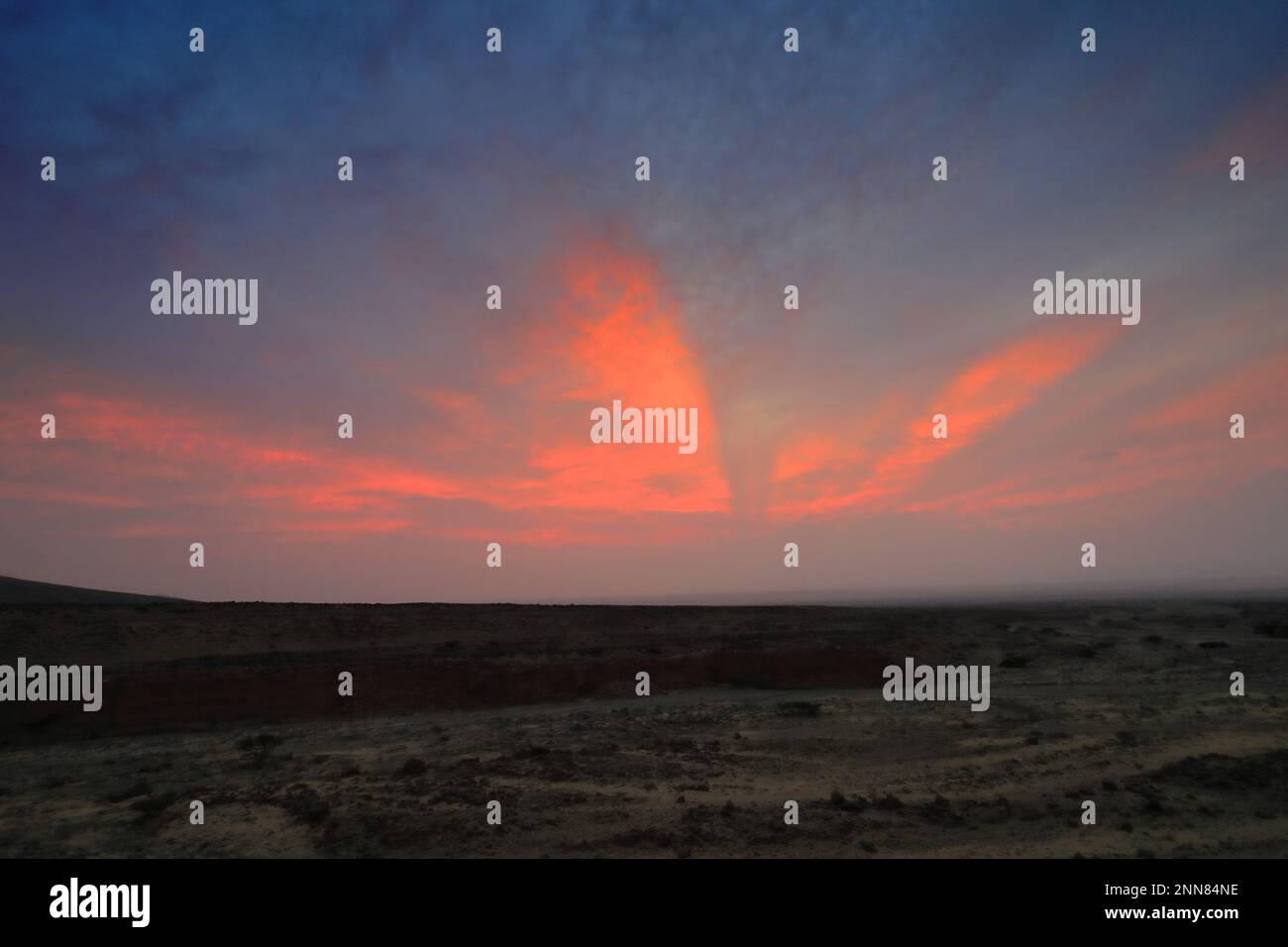 Sunset over the landscape in Wadi Barwas, Al-Sharat, Wadi Araba Desert ...
