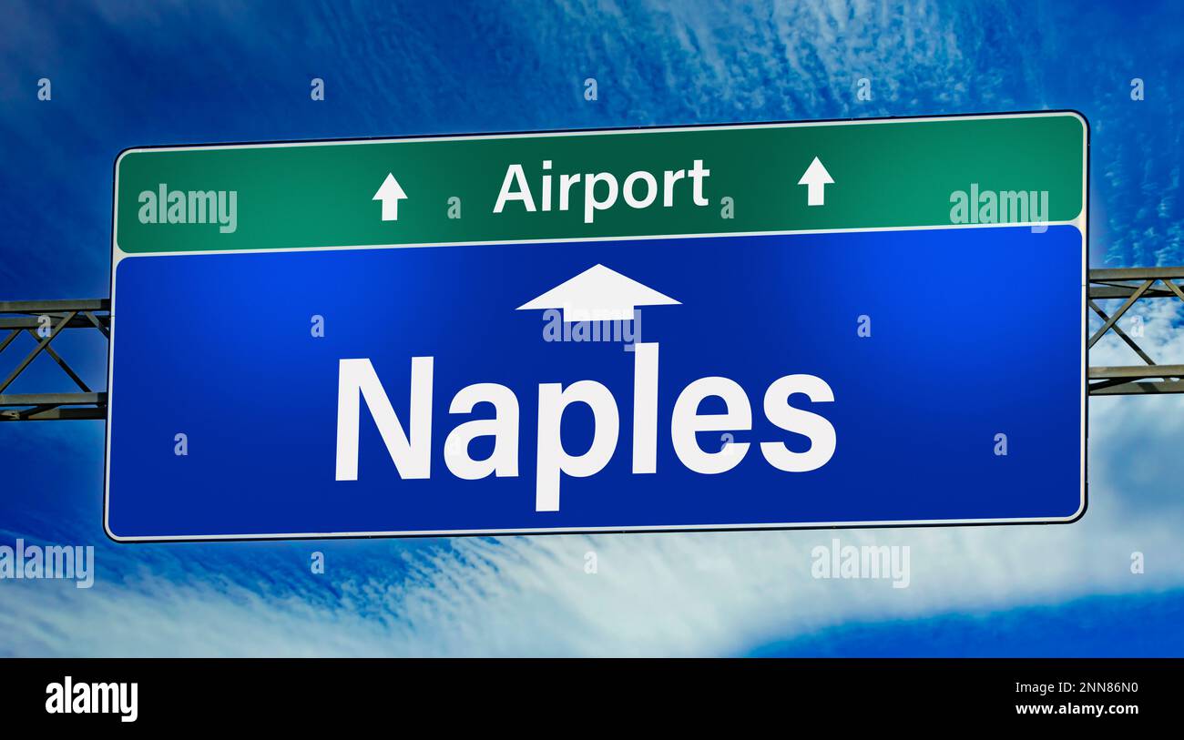 Road sign indicating direction to the city of Naples Stock Photo - Alamy