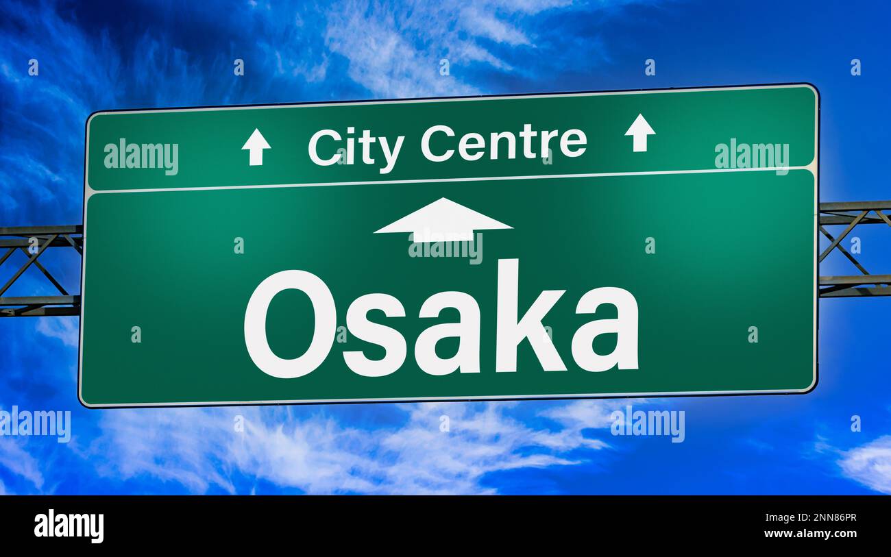 Road sign indicating direction to the city of Osaka Stock Photo - Alamy