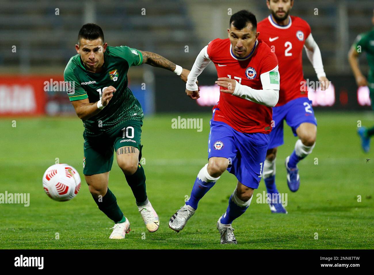 Chile's Gary Medel, right, and Bolivia's Henry Vaca battle for the ball ...
