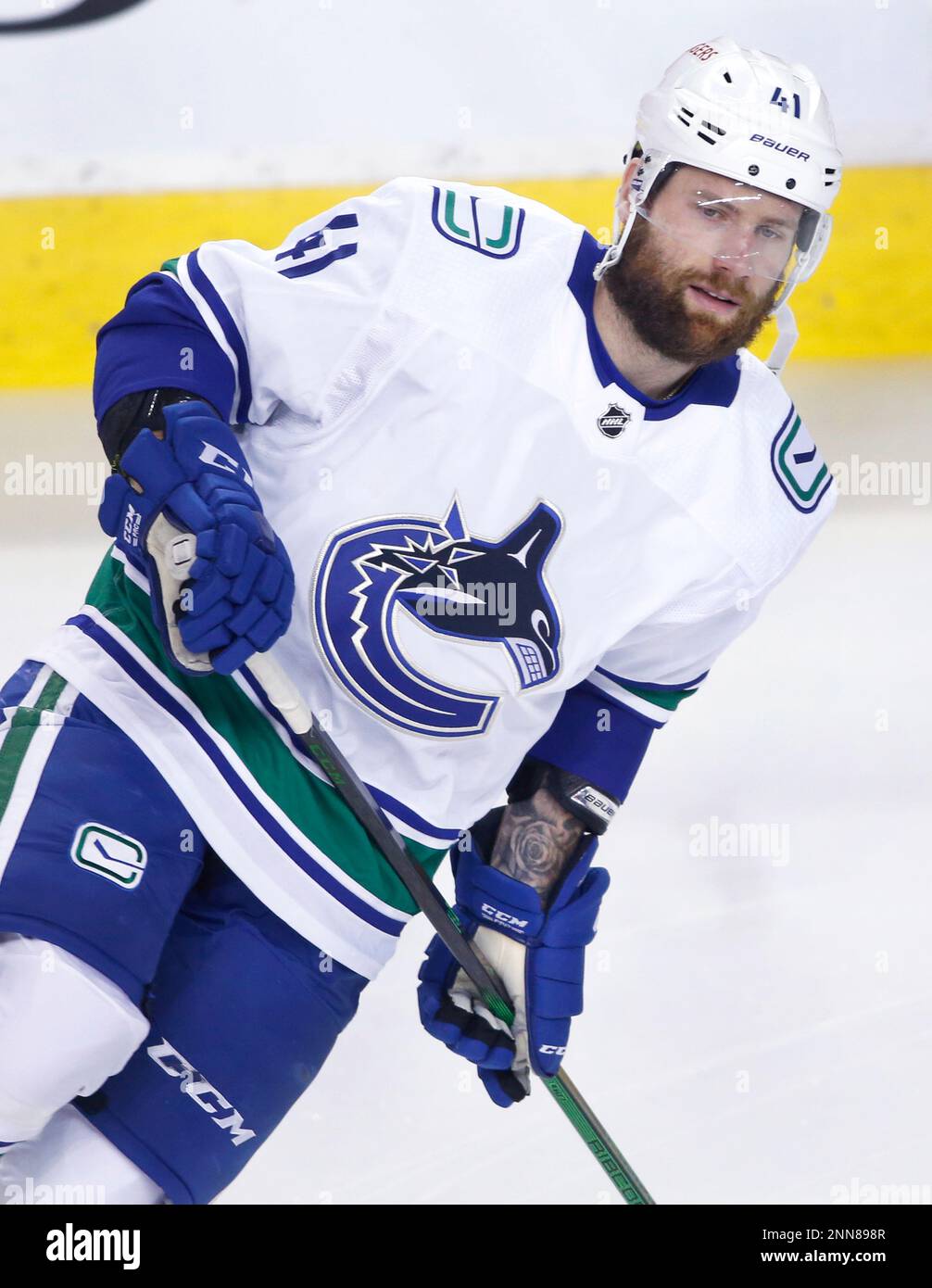 NHL profile photo on Vancouver Canucks player Jonah Gadjovich at a game ...