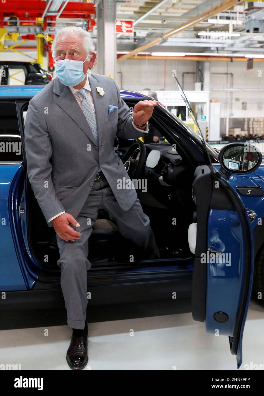 Britain's Prince Charles The Prince of Wales gets out of a MINI car ...