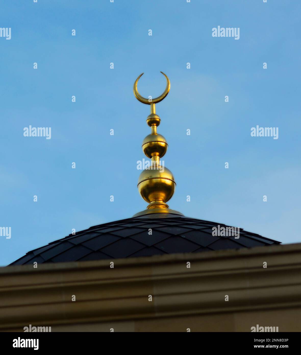 Dome of mosque with a signs of crescent and star. The Ar-Rahma Mosque ...