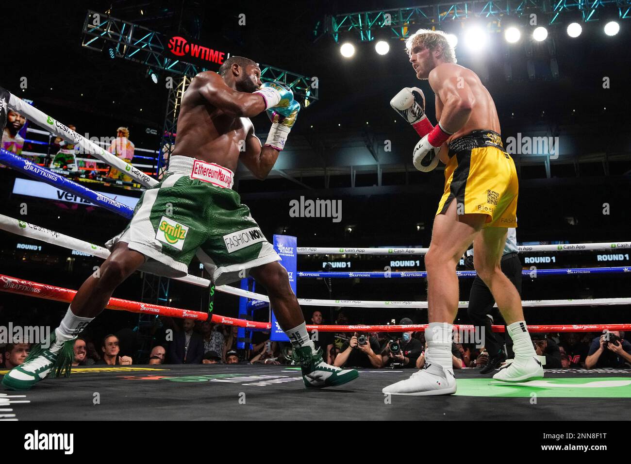 Boxer Floyd Mayweather (left) fights influencer Logan Paul (right ...