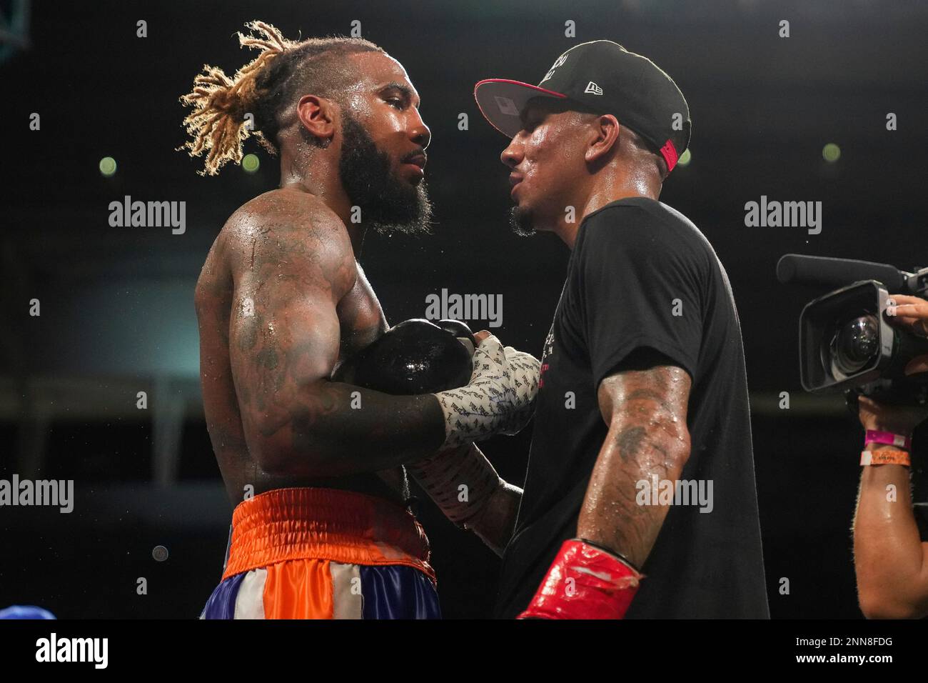 Boxer Jarrett Hurd (left) greets Luis Arias (right) following their ...