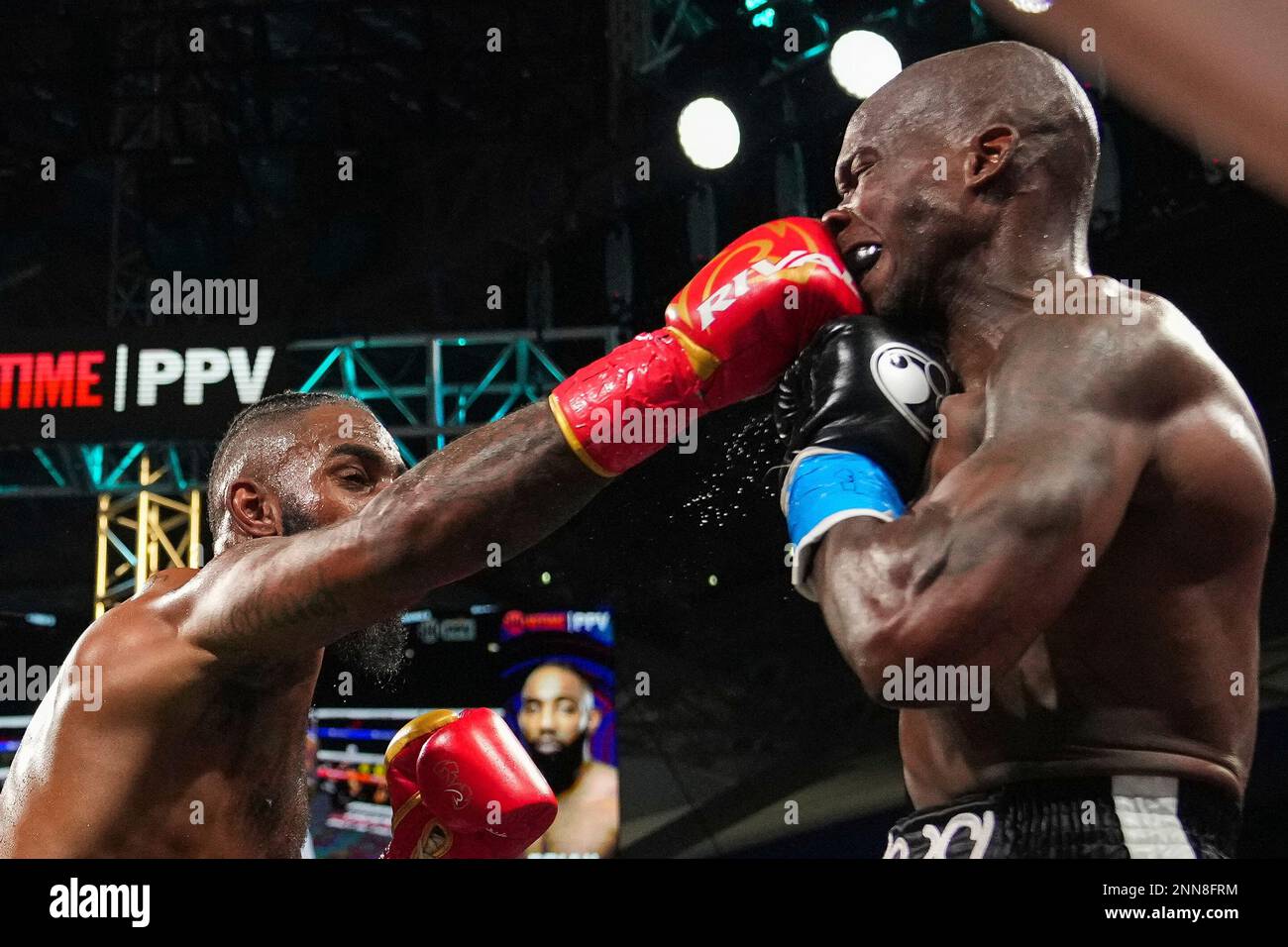Former NFL wide receiver Chad "Ochocinco" Johnson (right) is struck in ...