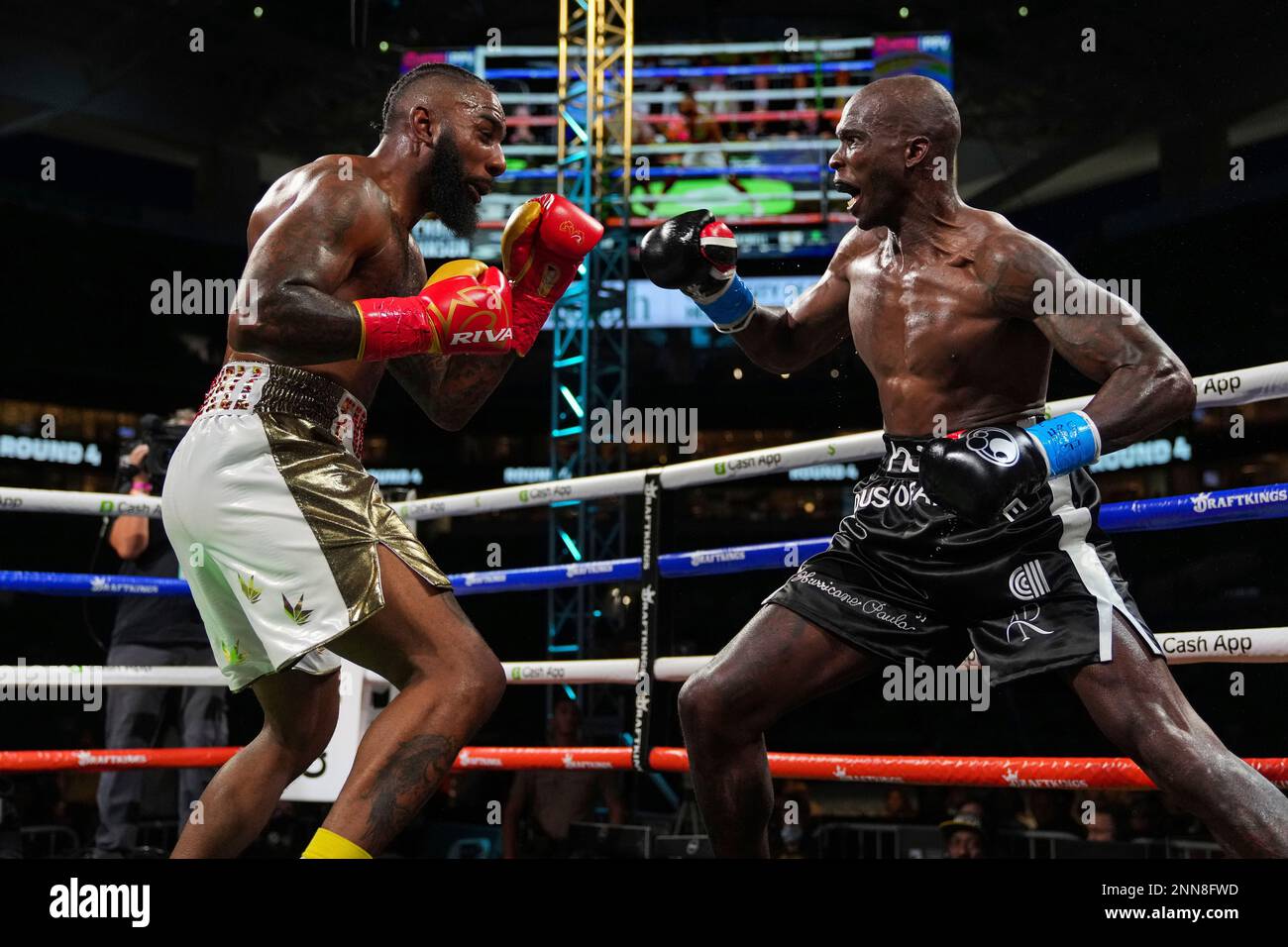 MMA fighter Brian Maxwell (left) fights against former NFL wide ...