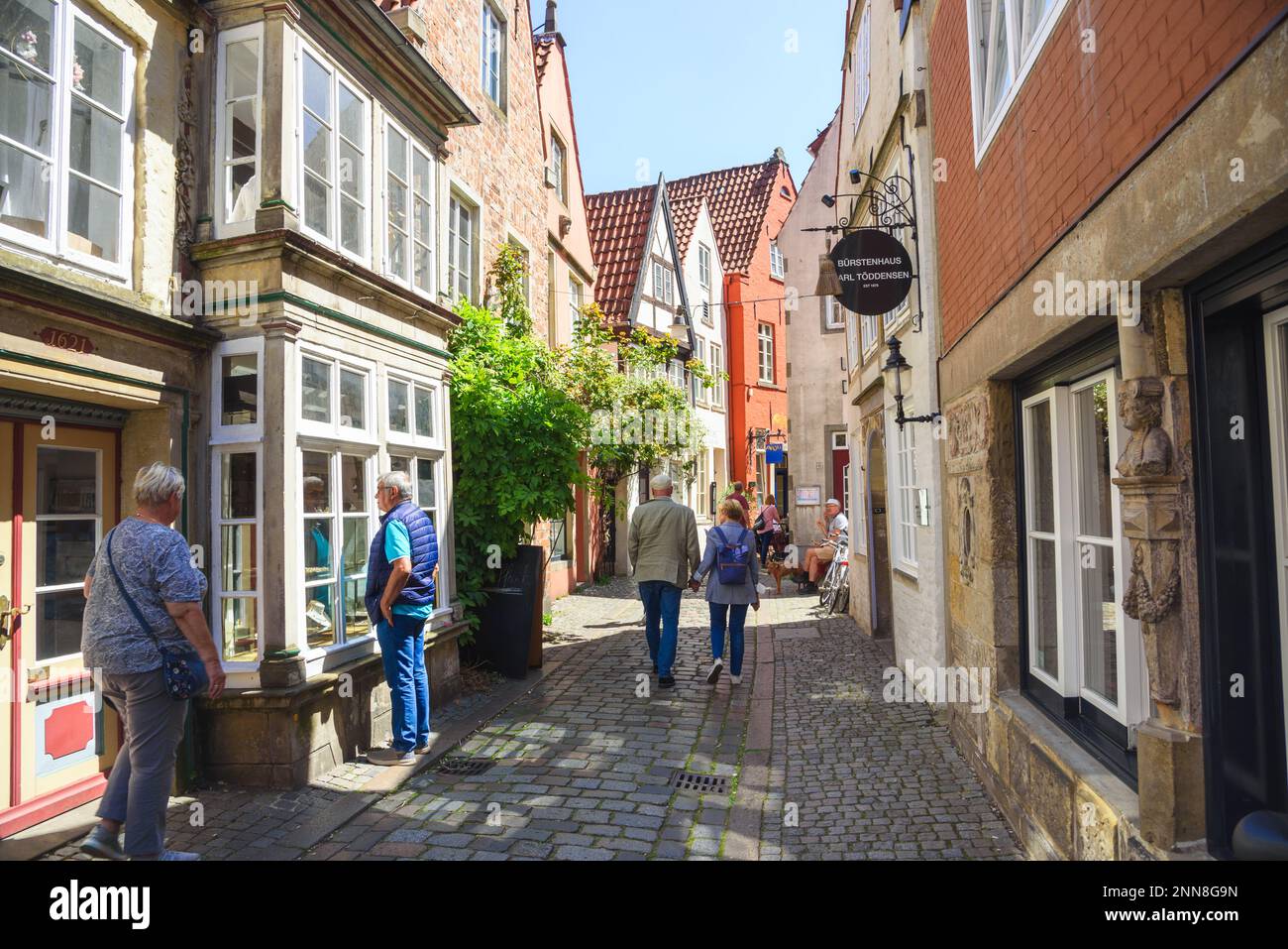 People window shopping in the historic district of Schnoor in Bremen ...