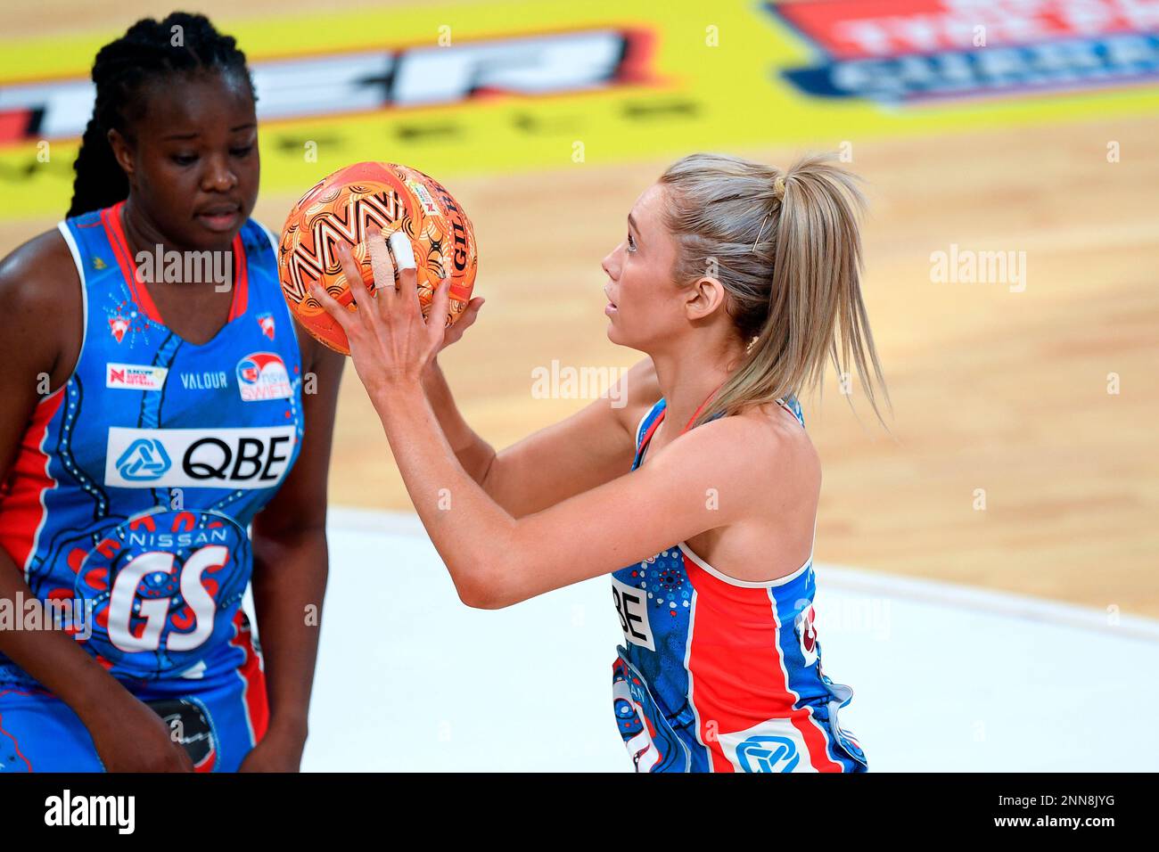 SYDNEY, AUSTRALIA - JUNE 06: Helen Housby of the NSW Swifts shoots for ...