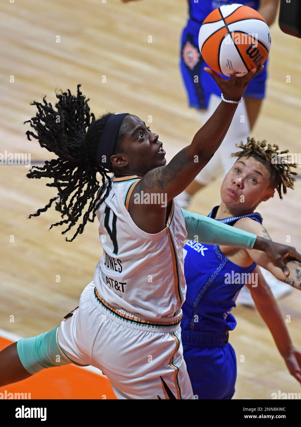 New York Liberty guard Jazmine Jones commits an offensive foul on ...