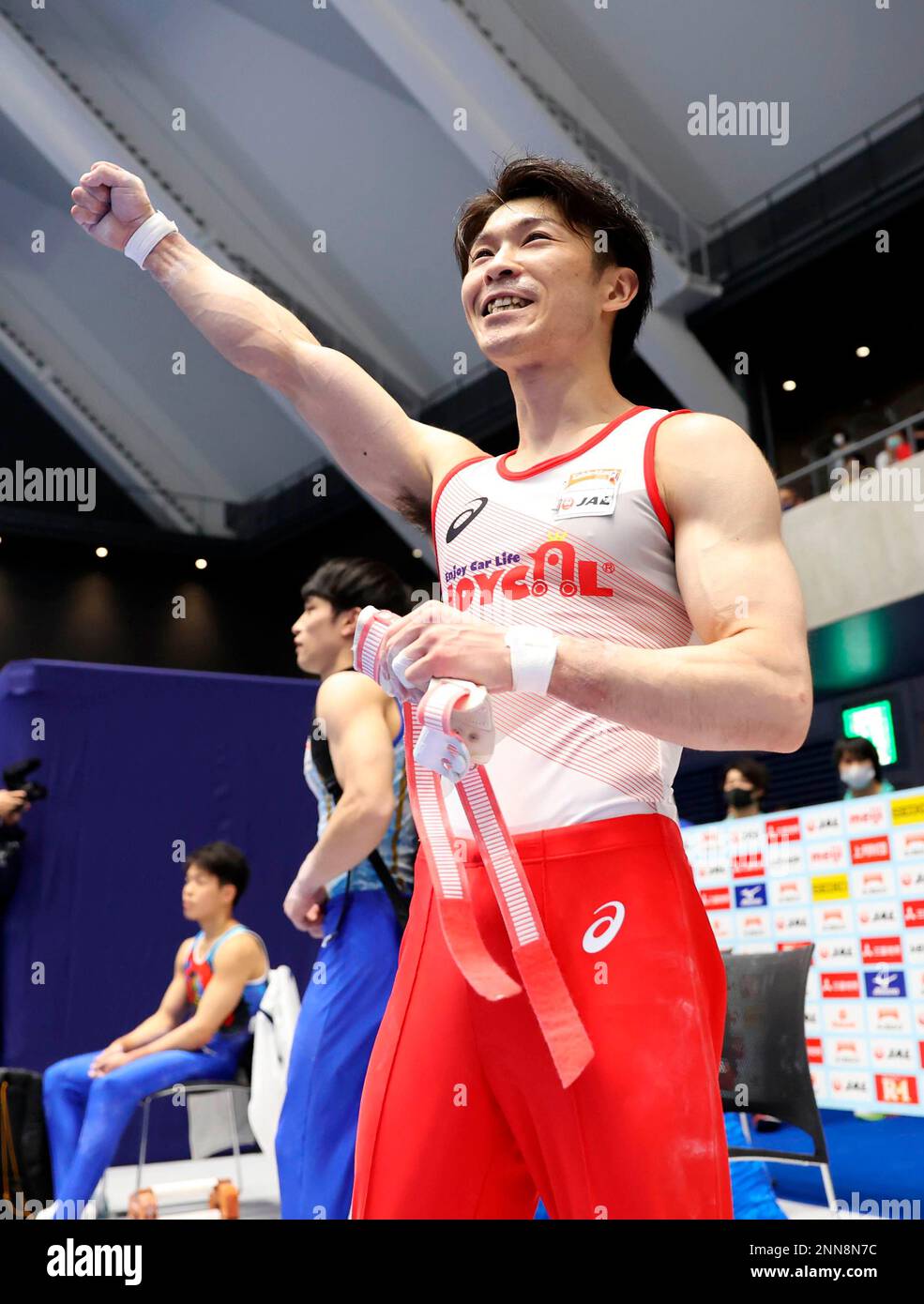 Kohei Uchimura reacts after peformin a horizontal bar during Day 1 of ...