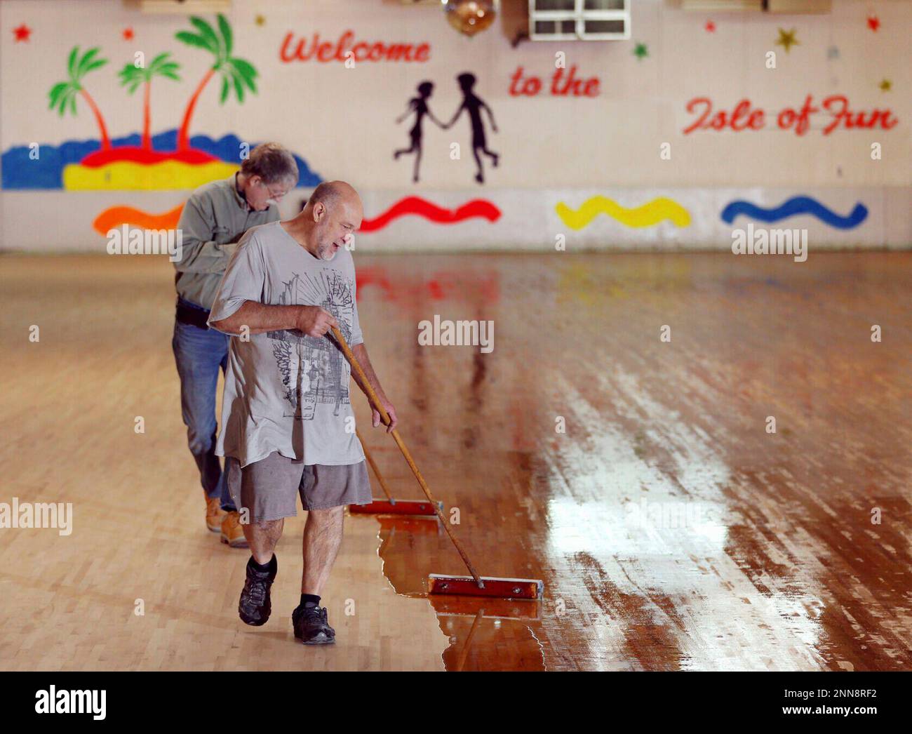 In this 2017 photo, Mike Stroyek and Doug Eno with Hart Floors, Inc ...