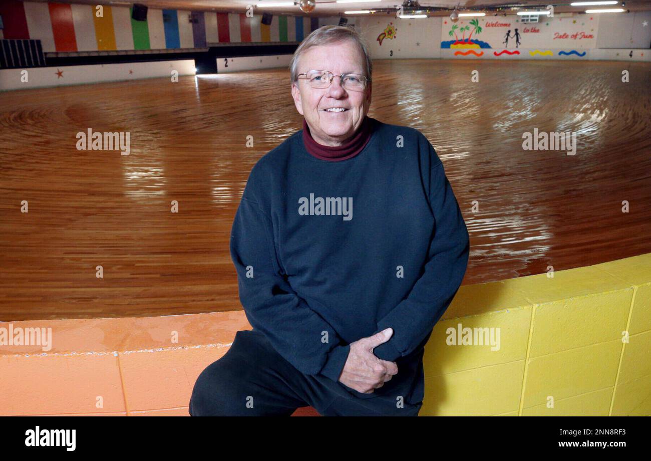 Steve Anderson, owner of Skate Island, sits at rinkside as the first ...