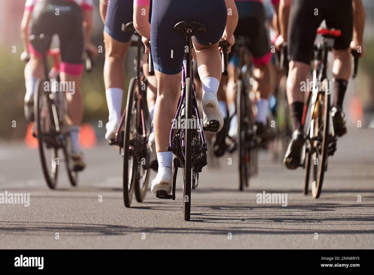 Cycling competition, cyclist athletes riding a race Stock Photo - Alamy