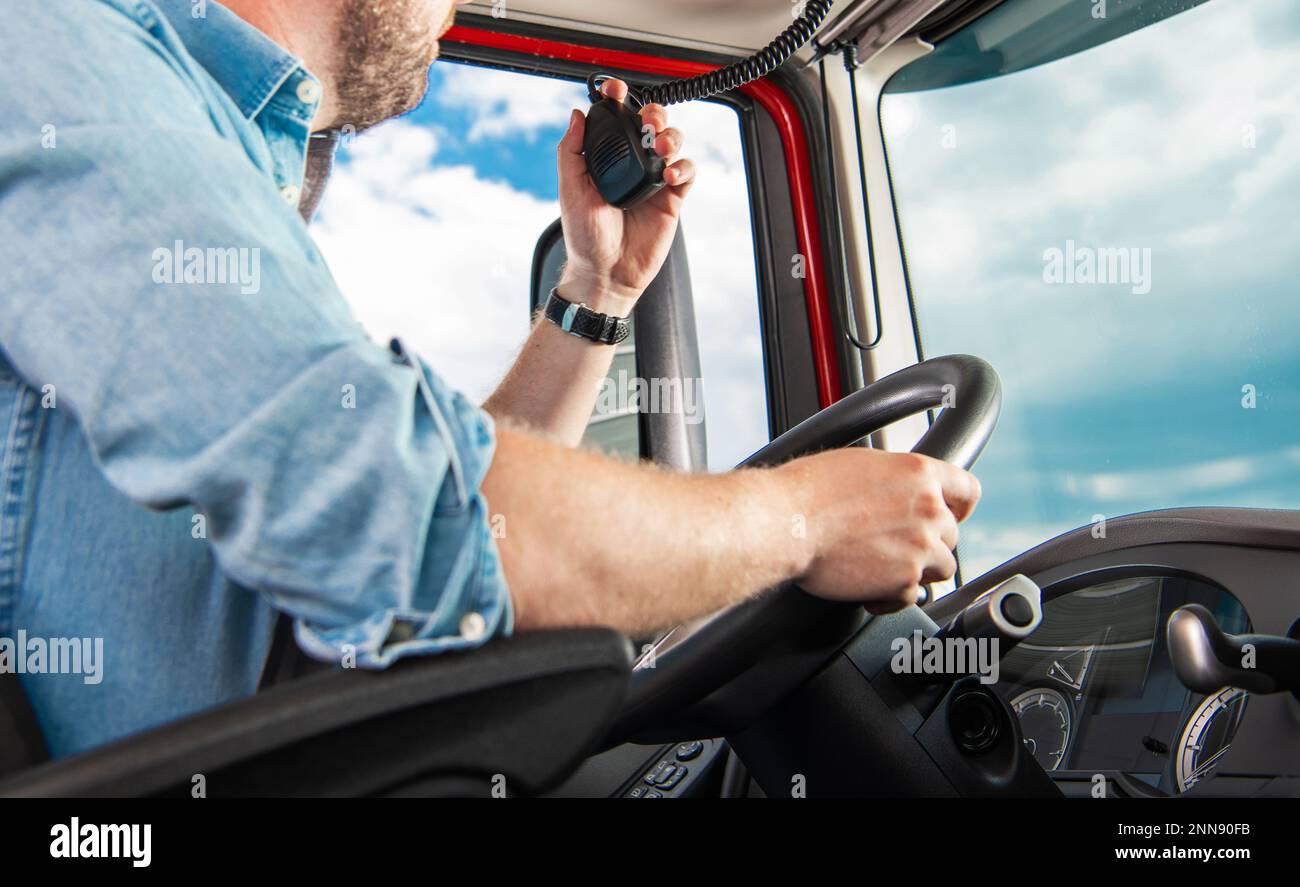 Closeup of Professional Caucasian Truck Driver Communicating via ...