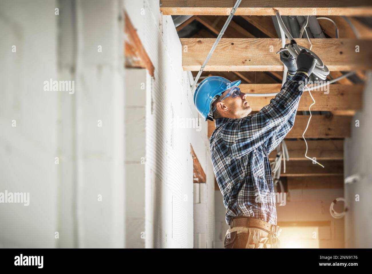 Professional Caucasian Electrician Working on Electrical Wiring System ...