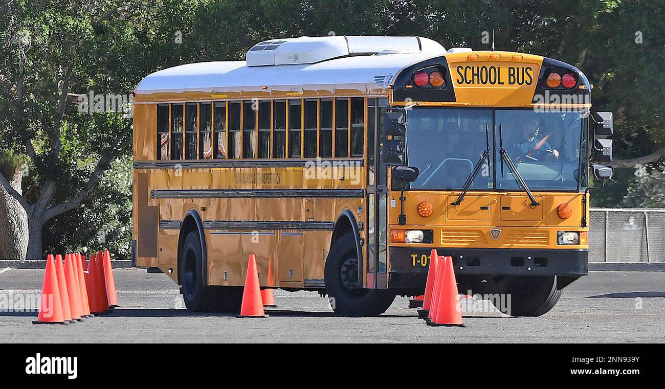 A school bus driver in training successfully parallel parks a 35-foot ...