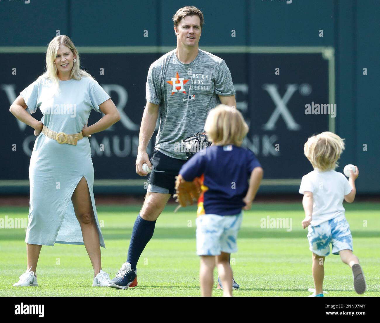 Houston Astros starting pitcher Zack Greinke plays with his sons ...