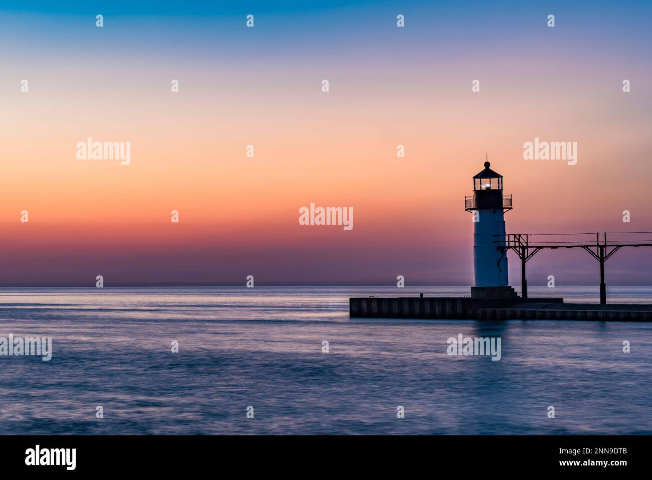 St. Joseph North Pier Lighthouse on Lake Michigan at sunset, St. Joseph ...