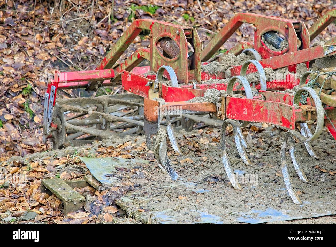 Part view of a agricultural spring tine cultivator Stock Photo - Alamy